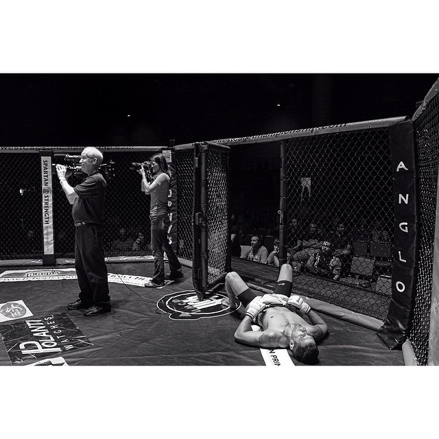 Collapsed from exhaustion after losing a fight. #mma #photojournalism # ...